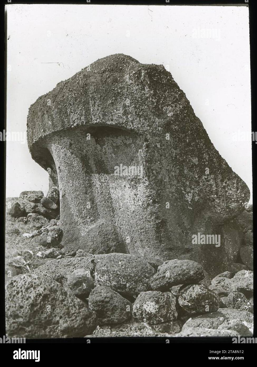 View of a moai head partially burried under rocks; Ahu Tongariki, Oc,G ...