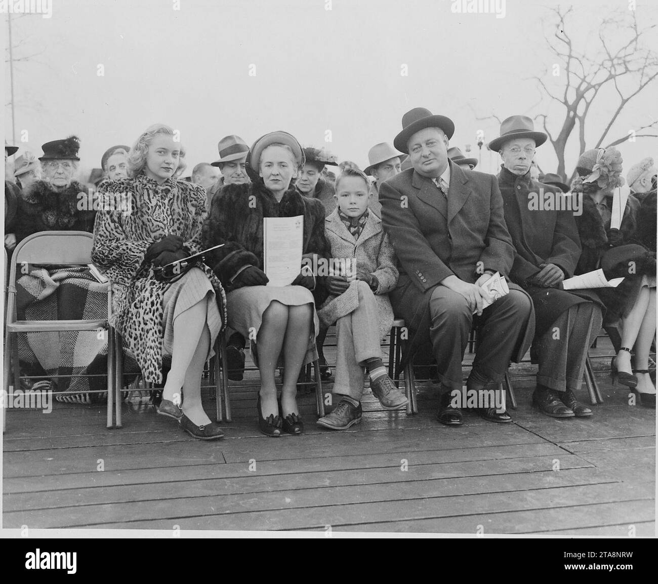 View of audience at ceremonies for the lighting of the White House ...