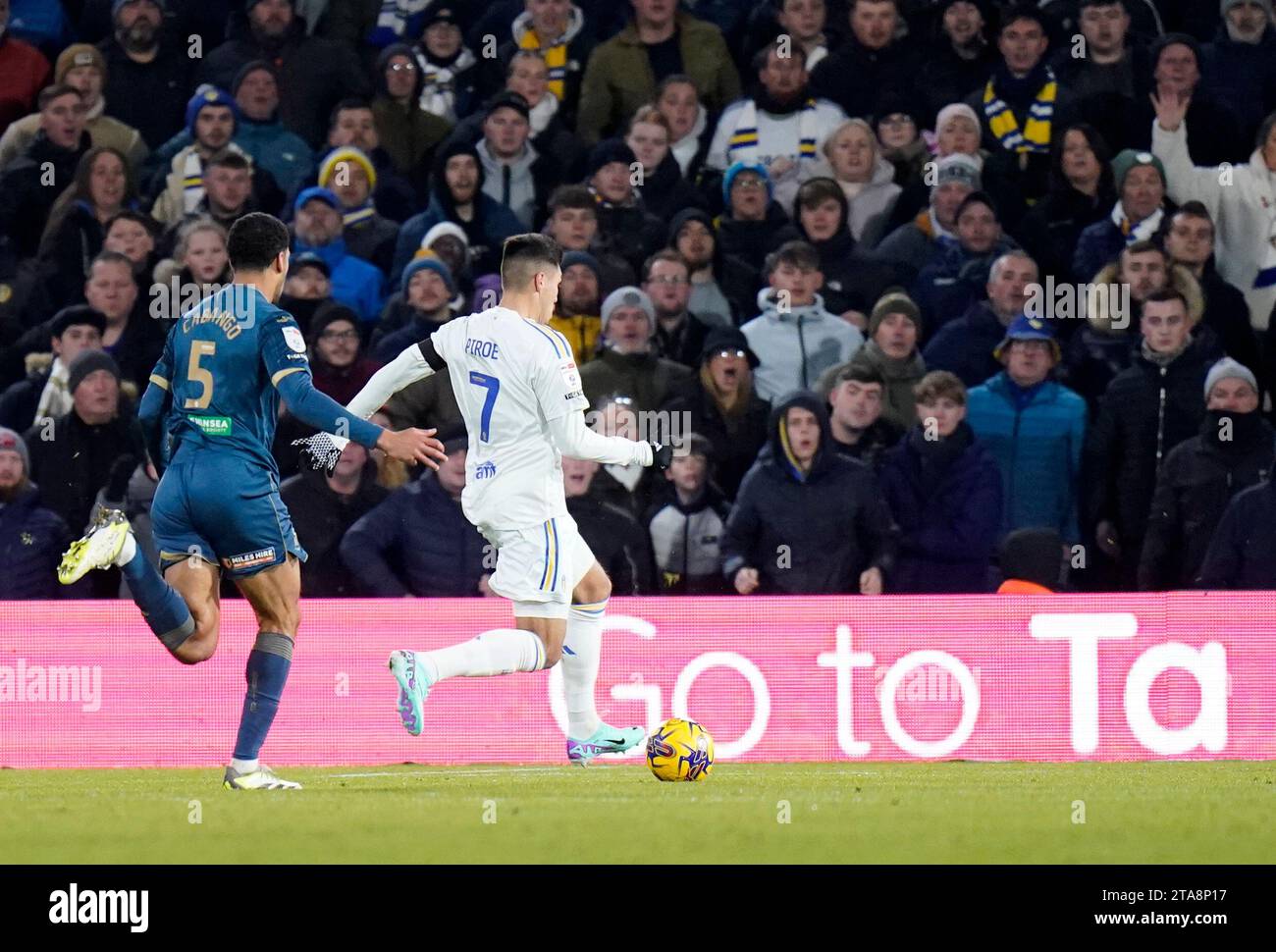 Leeds United's Joel Piroe (left) scores their side's first goal of the ...