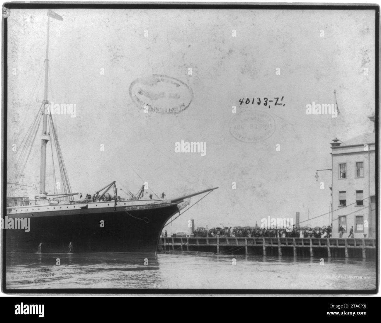 View of bow of NEW YORK and crowd on wharf, New York City Stock Photo ...