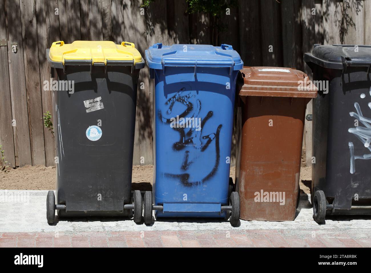 Colourful Different Recyclables And Garbage Cans, Standing On The Road ...