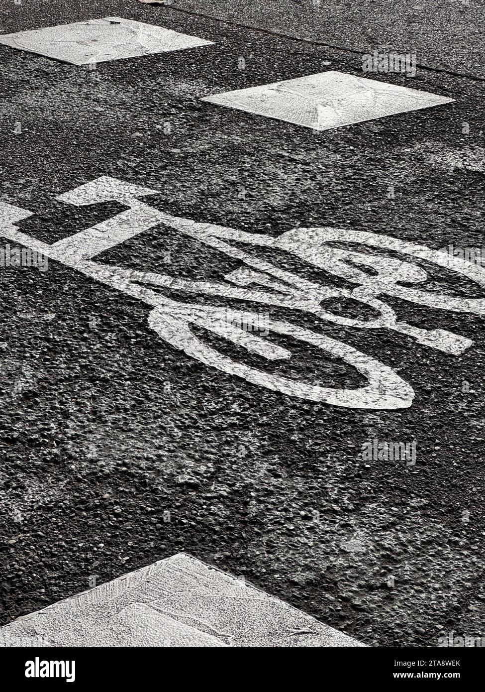 Bike lane sign on road Stock Photo - Alamy