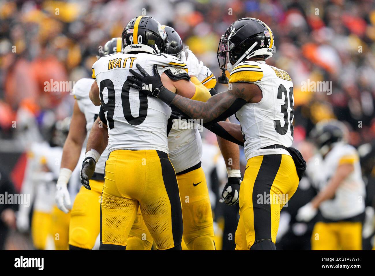 Pittsburgh Steelers' T.J. Watt (90) celebrates with Cameron Heyward (97 ...
