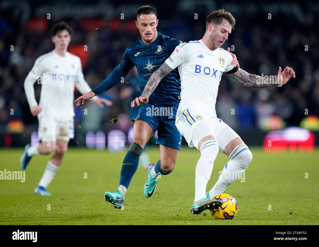 Swansea City's Jerry Yates and Leeds United's Joe Rodon battle for the ...
