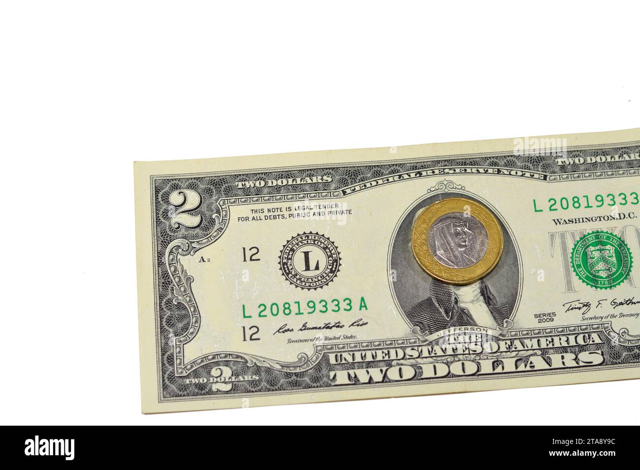 One Saudi Arabia riyal coin year 2016 on 2 American dollars USD paper ...