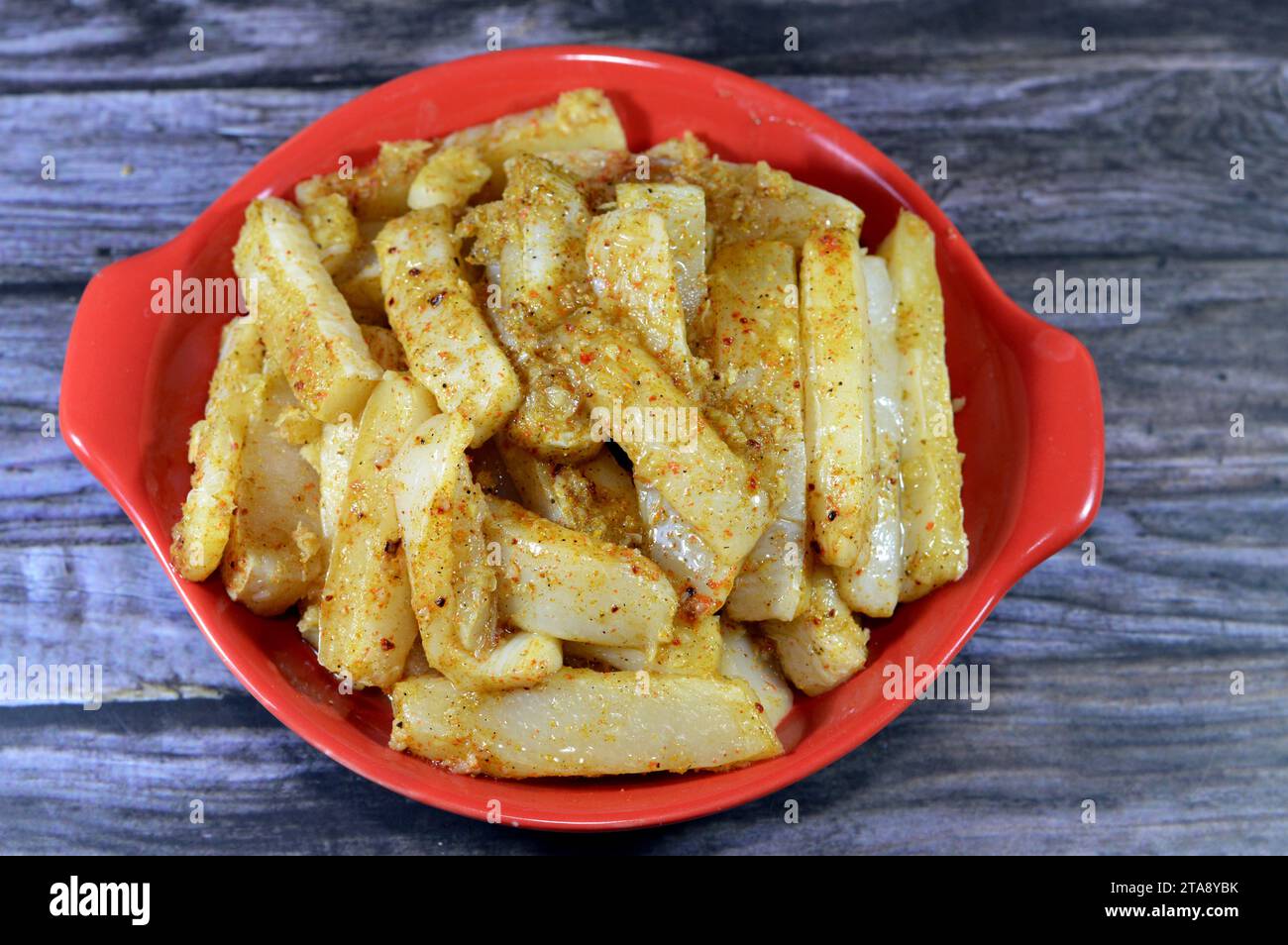 Fresh raw uncooked squid, a mollusc with an elongated soft body, large ...