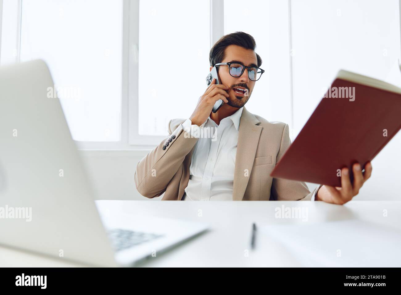 Office man computer phone laptop winner smile businessman talk ...