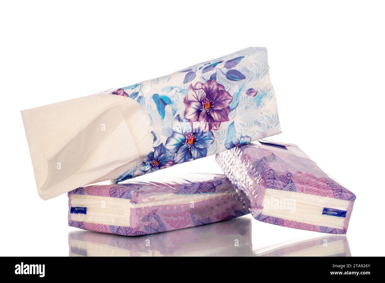 Three packs of paper handkerchiefs, close-up, isolated on white ...