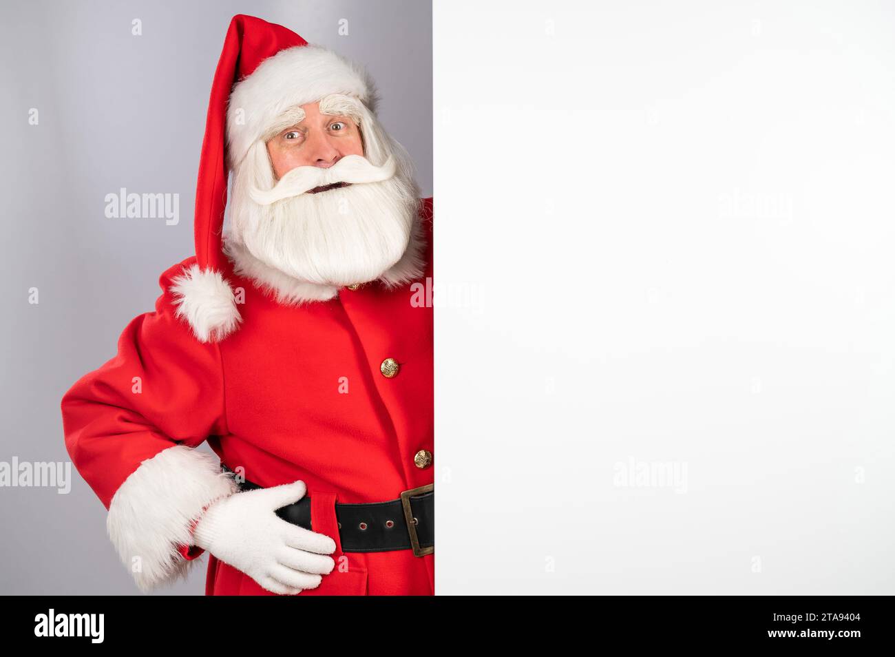 Santa claus points to an empty space. Christmas advertisement Stock ...