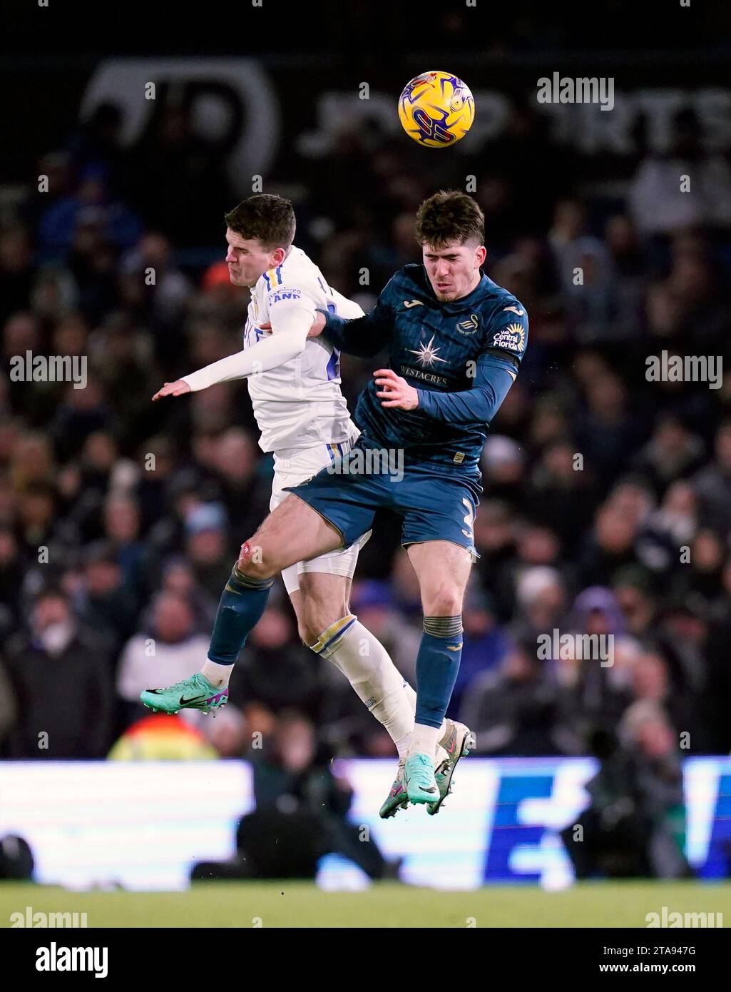 Leeds United's Sam Byram (left) and Swansea City's Joshua Key battle ...
