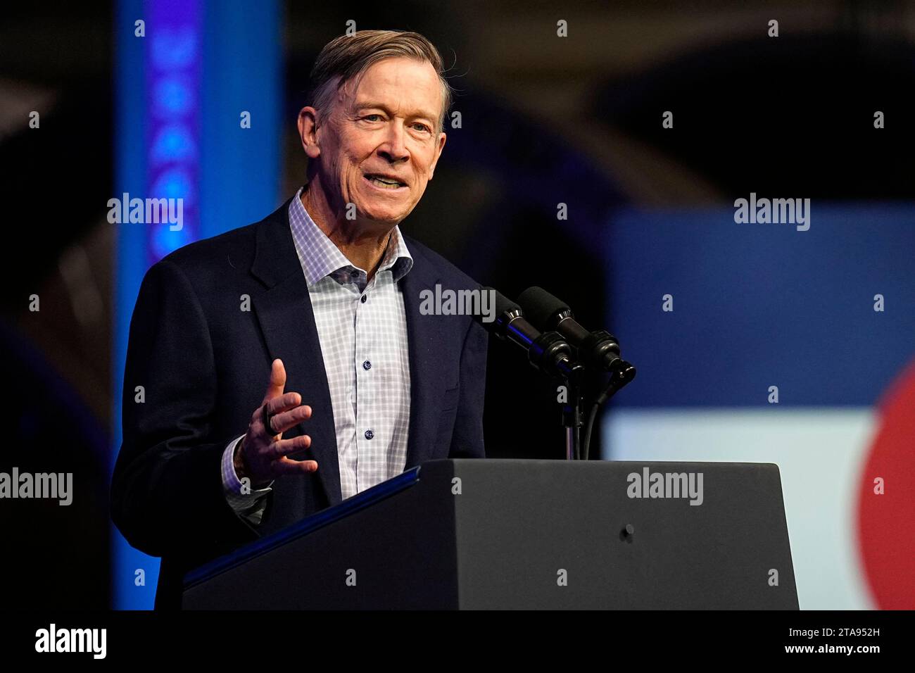 Sen. John Hickenlooper, D-Colo., speaks before President Joe Biden at ...