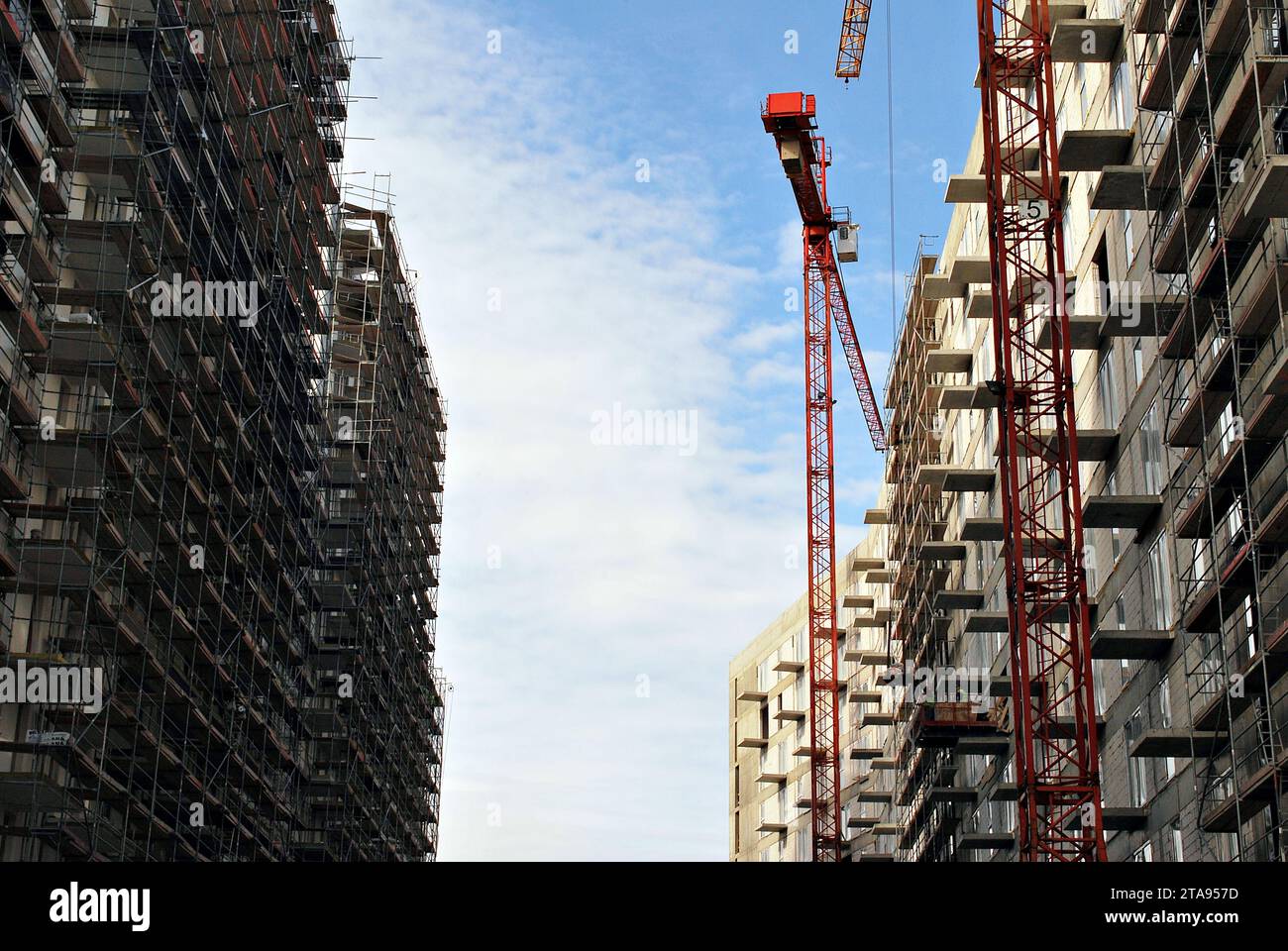 High rise building under construction. Installation of glass facade ...
