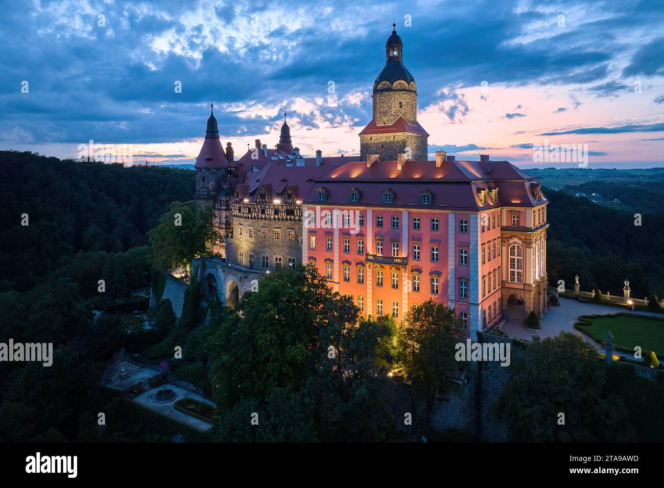 Evening aerial view of the illuminated Ksiaz Castle, Schloss ...
