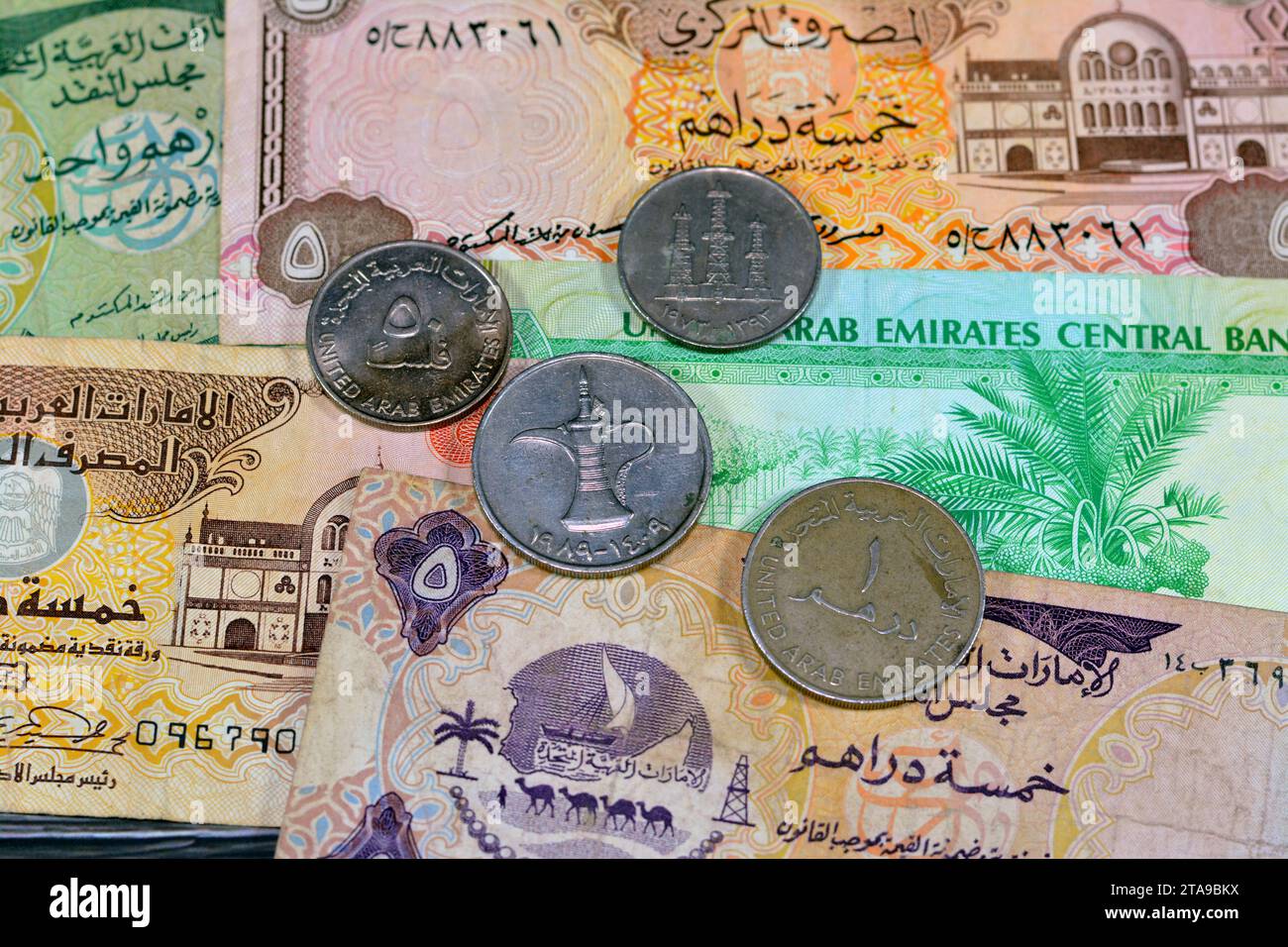United Arab of Emirates money background of old coins and banknotes of ...