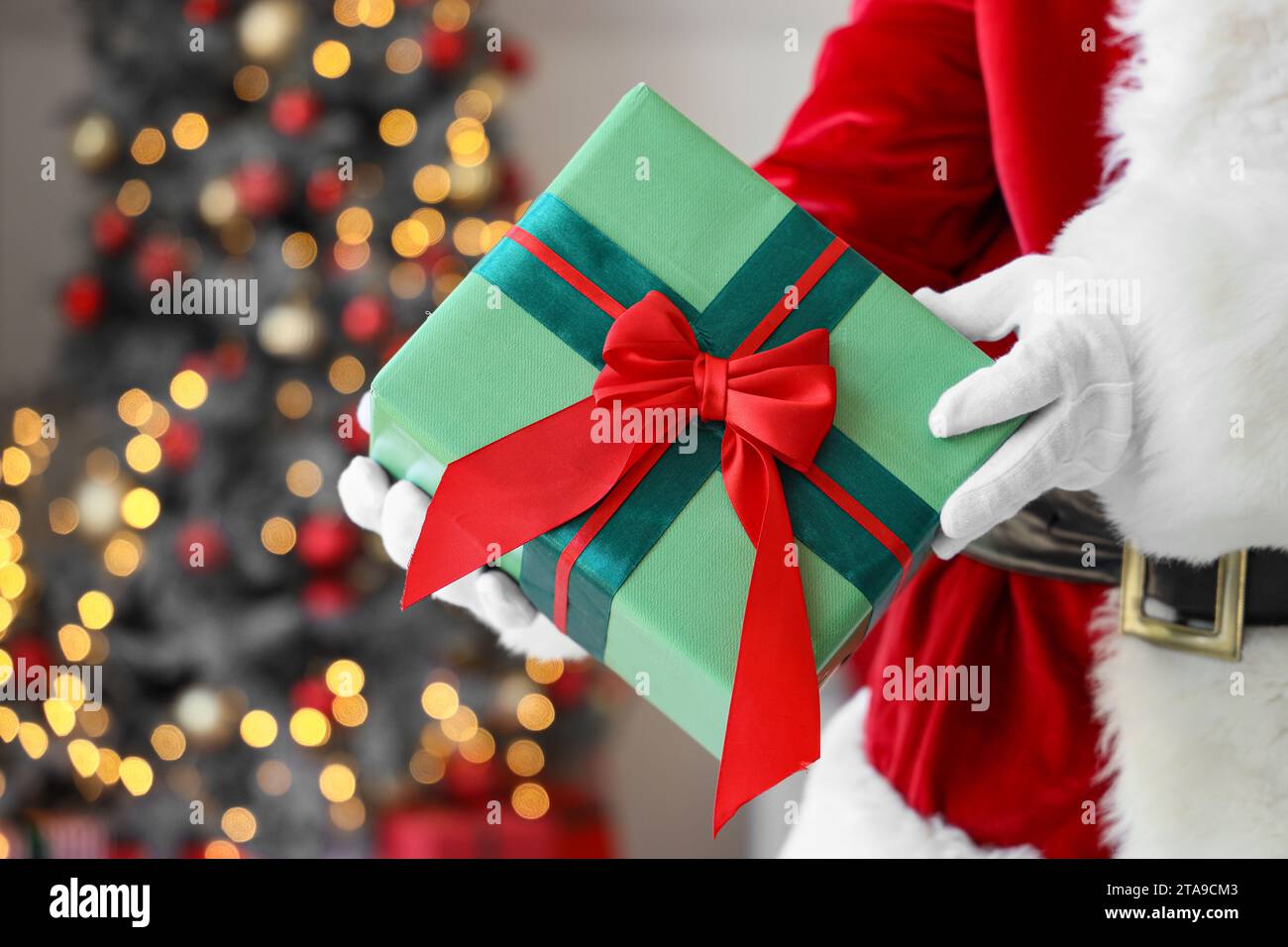 Man dressed santa claus giving hi-res stock photography and images - Alamy