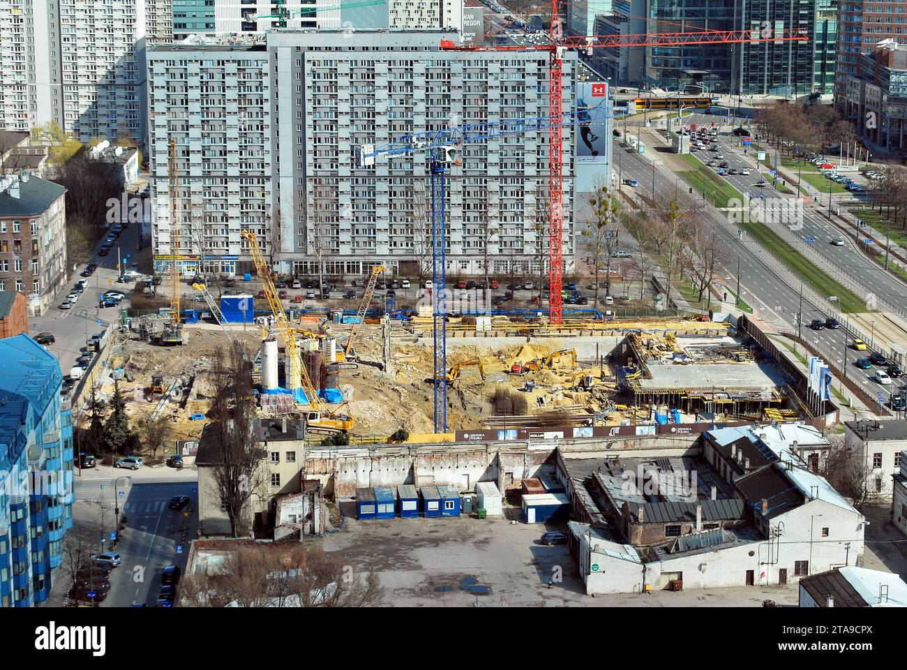 High rise building under construction. Installation of glass facade ...