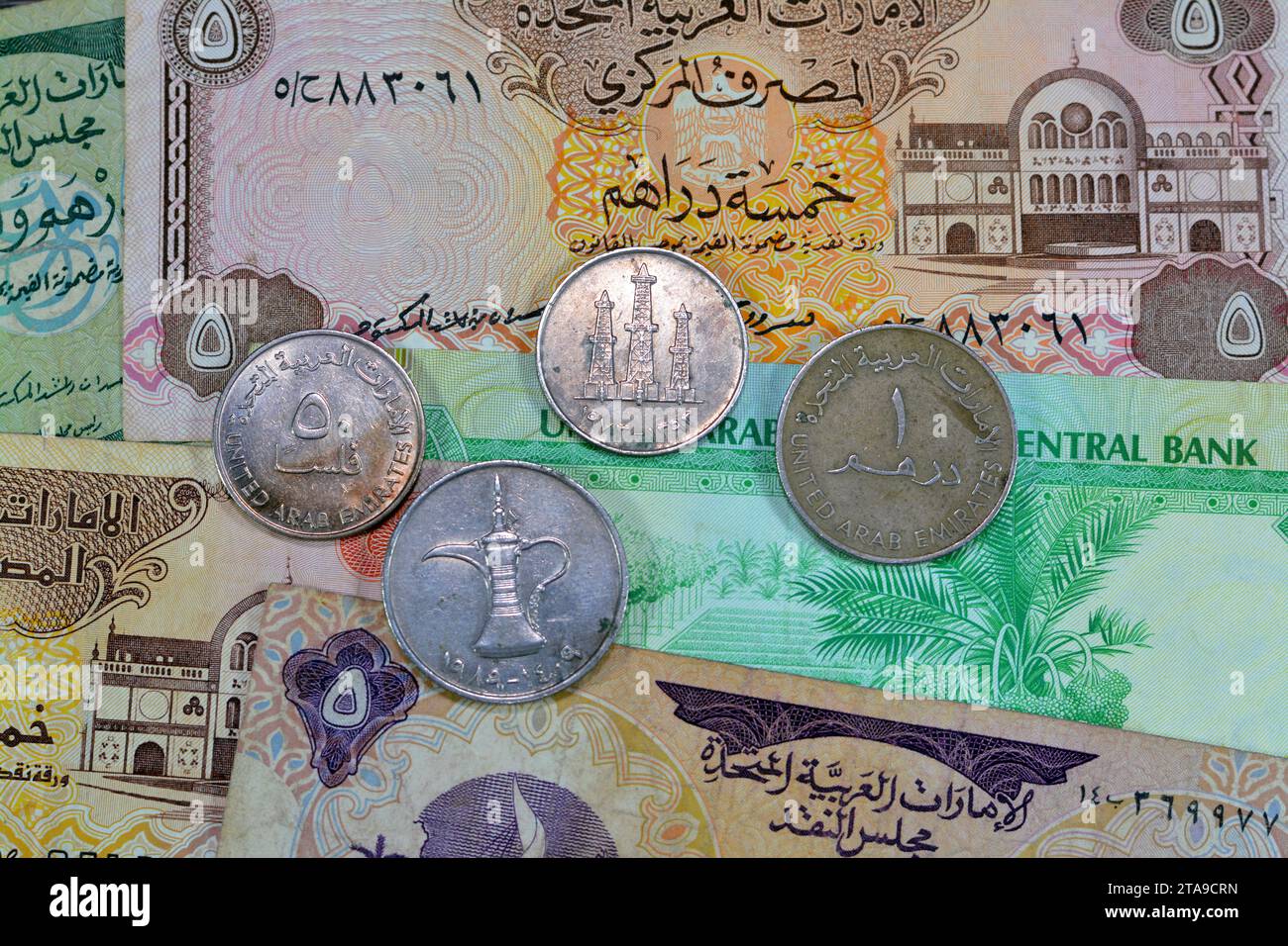United Arab of Emirates money background of old coins and banknotes of ...