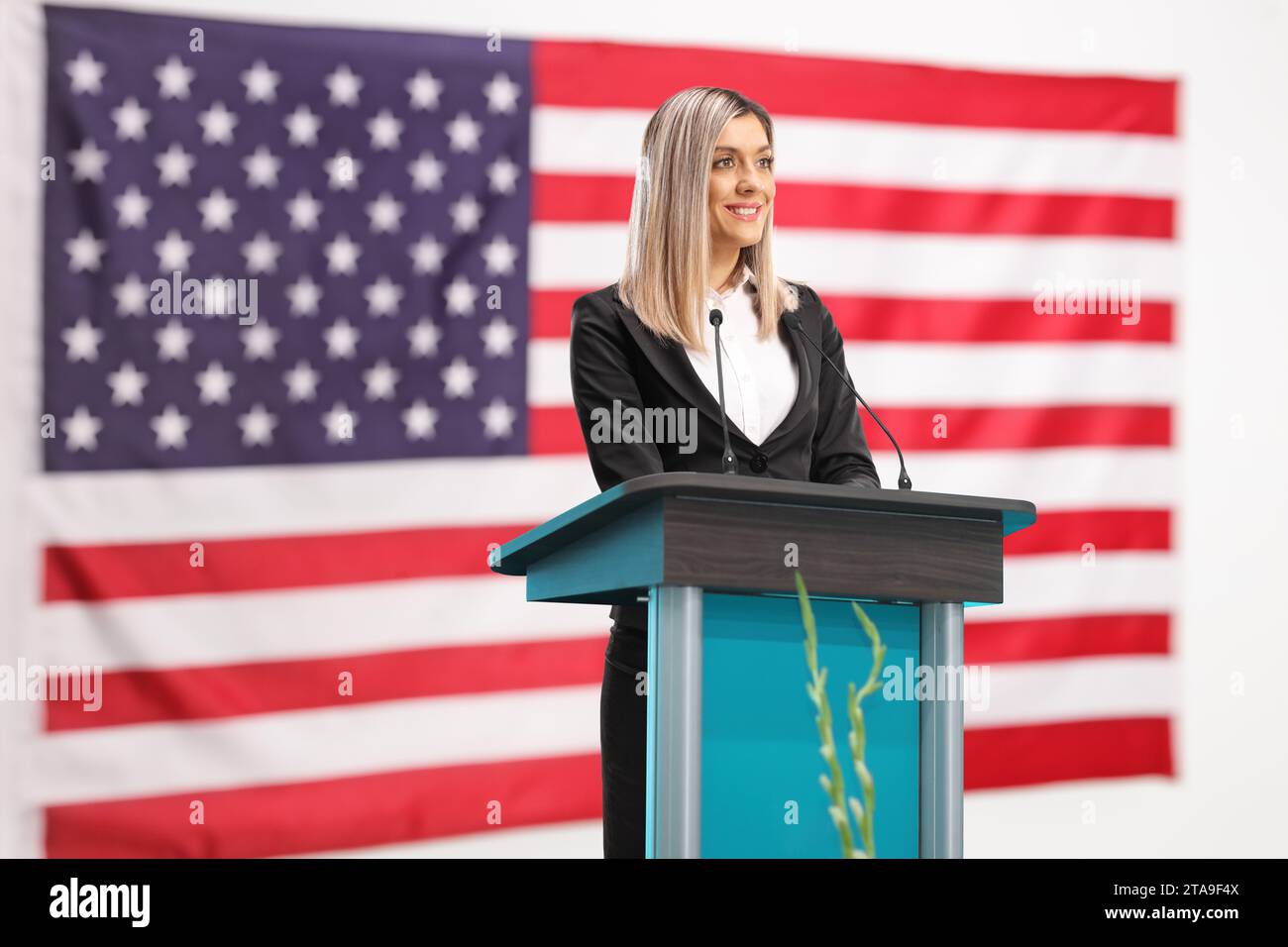 Female giving speech podium hi-res stock photography and images - Alamy