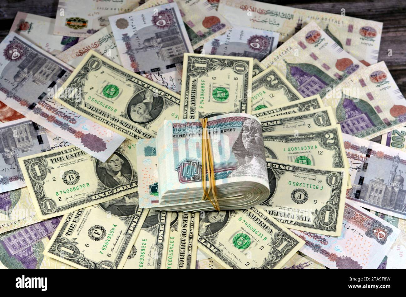 Folded Egyptian money banknote bills of 100, 200, 50 EGP LE one and two ...