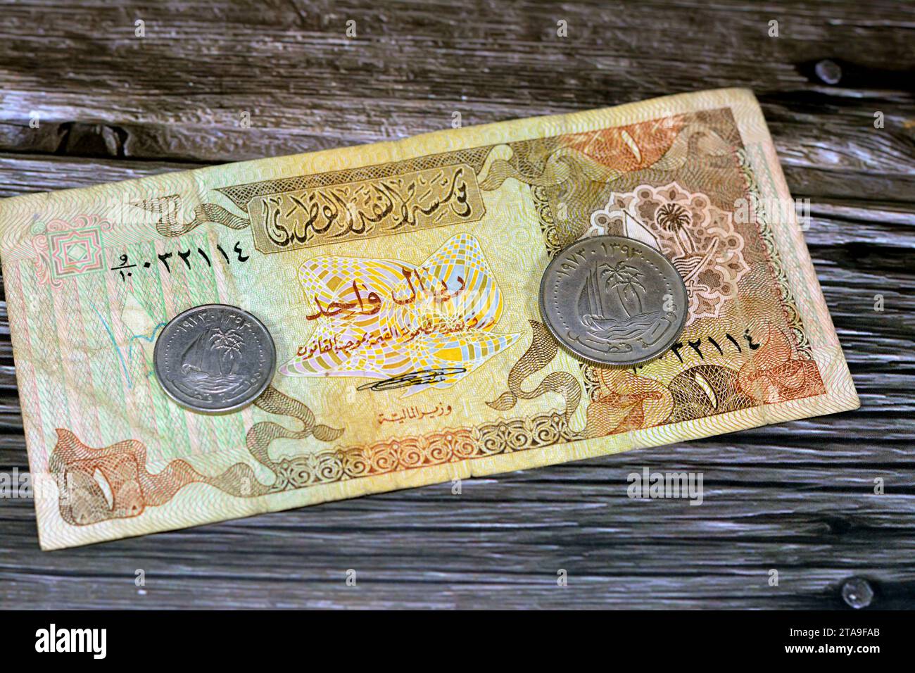 Qatari Money, money background of old coins and banknotes of riyals of ...