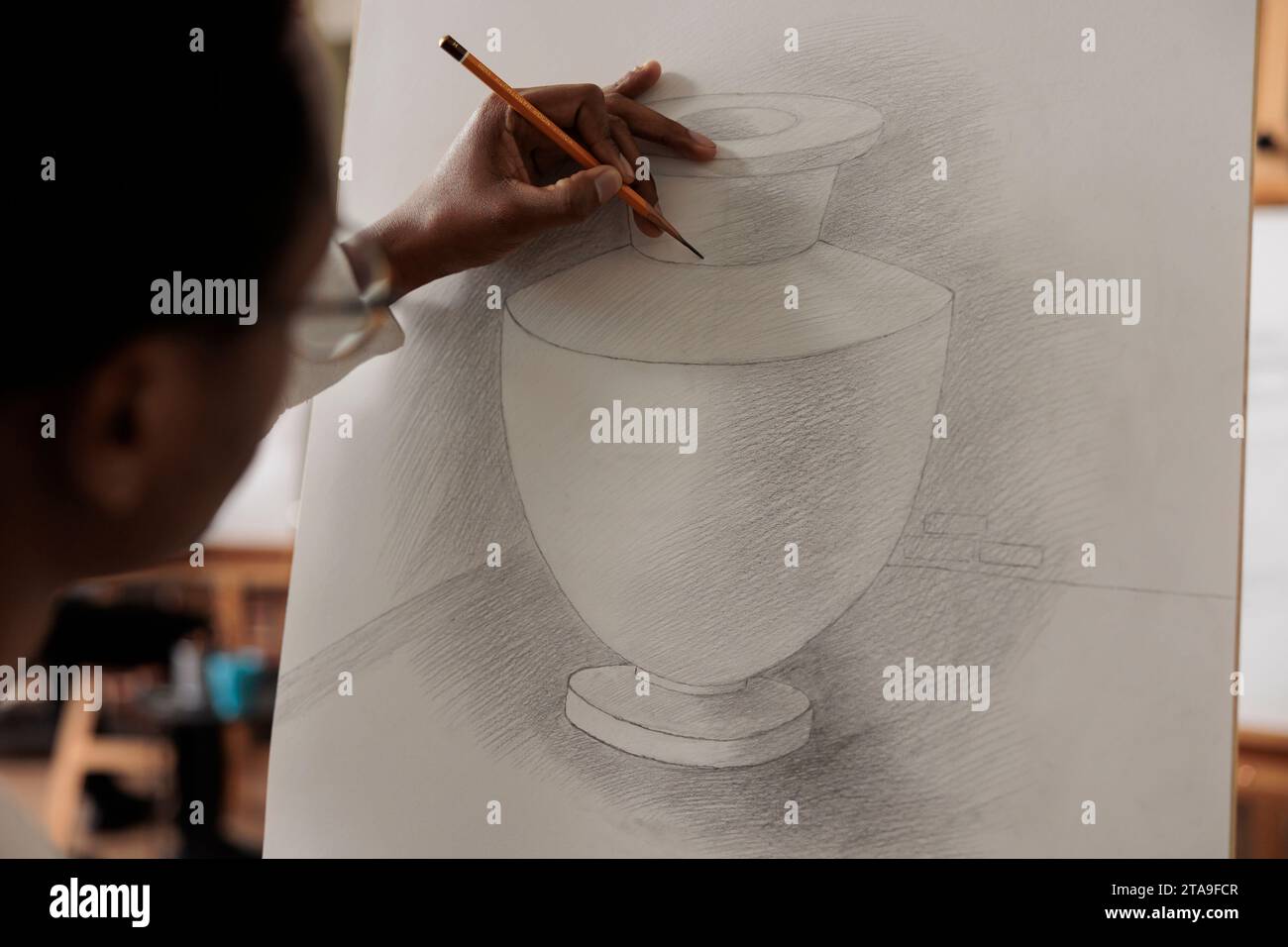 African American guy student improving drawing skills, attending art ...