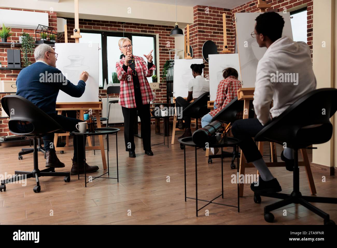 Learning to draw from proffesional instructor, diverse different aged ...