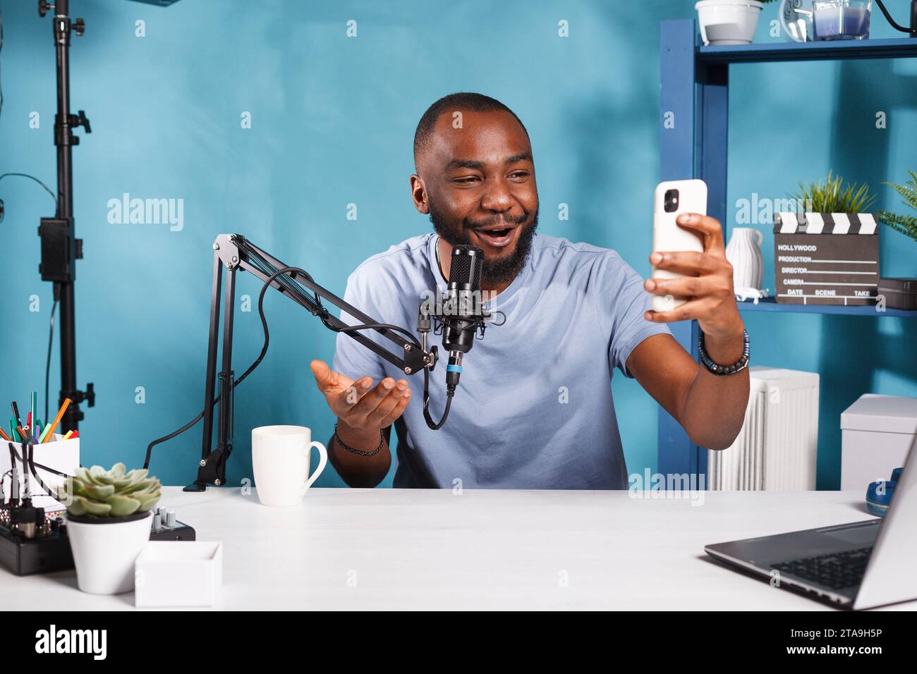 Blogger creating engaging content with smartphone and speaking to ...