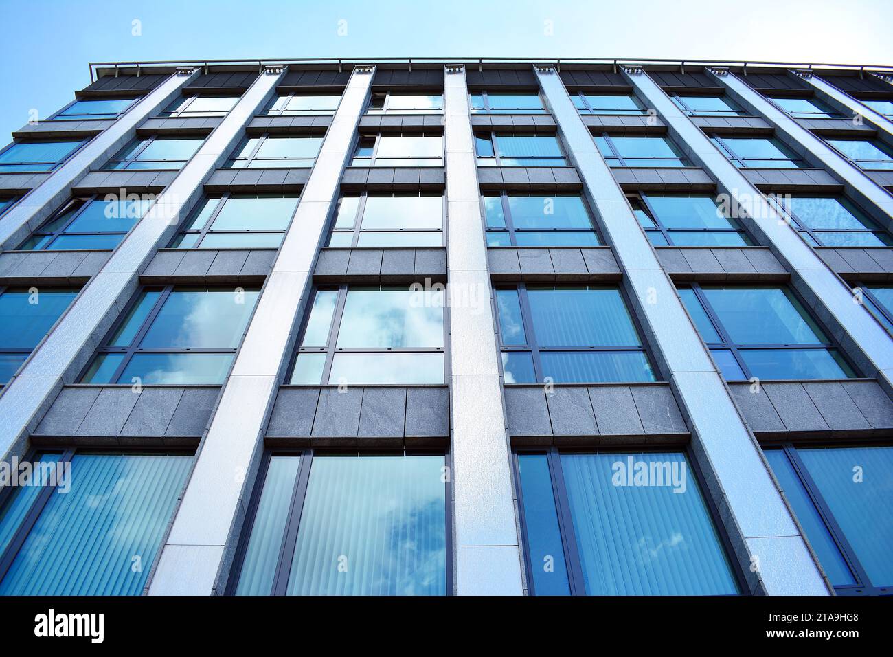 Modern office building in the city with windows and steel and aluminum ...