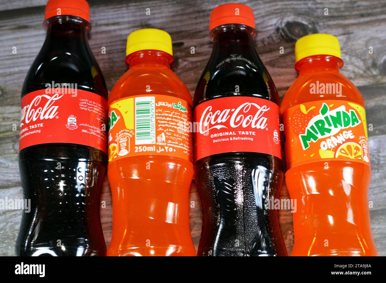 Cairo, Egypt, November 4 2023: Coca-Cola, or Coke and Mirinda plastic ...