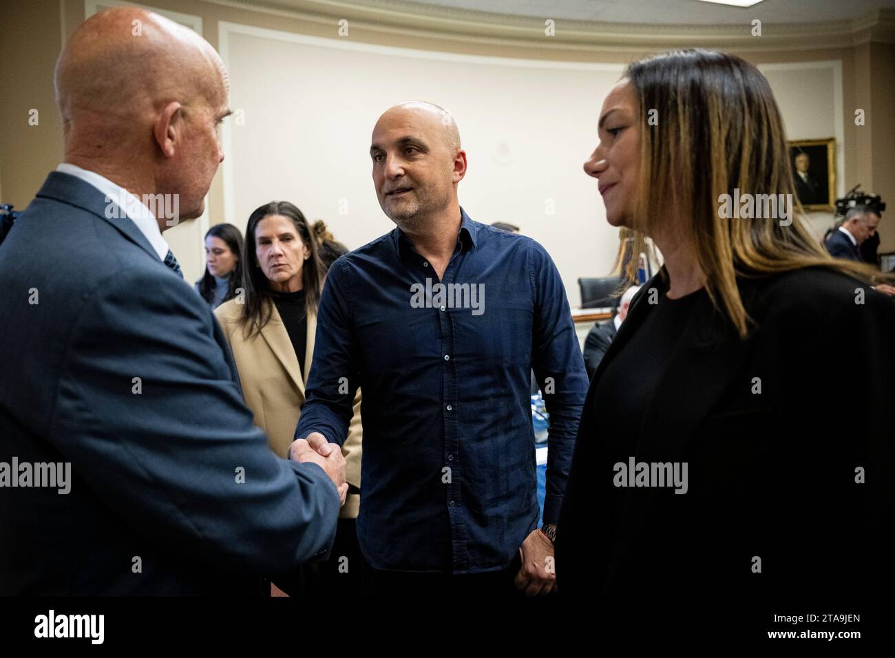 Washington, USA. 29th Nov, 2023. Adi Alexander (center), Father of Edan ...