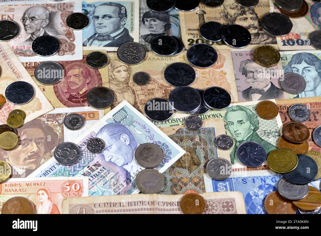 Old money currency of banknotes and coins from different countries of ...