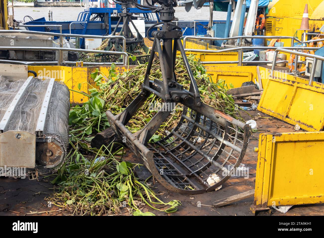A trash-cleaning boat for the floating trash and aquatic weed in Chao ...