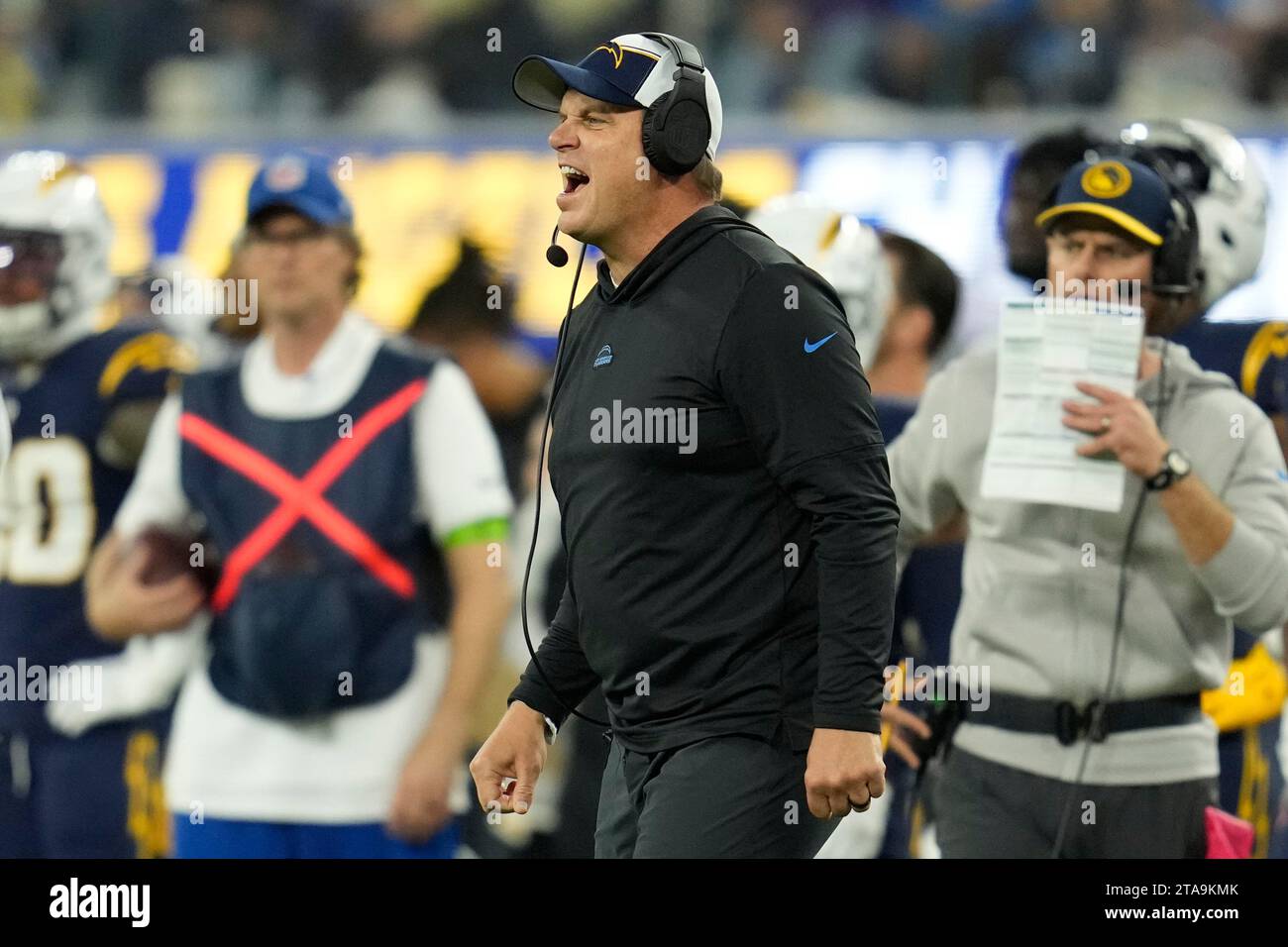 Los Angeles Chargers outside linebackers coach Giff Smith stands on the sideline during an NFL ...