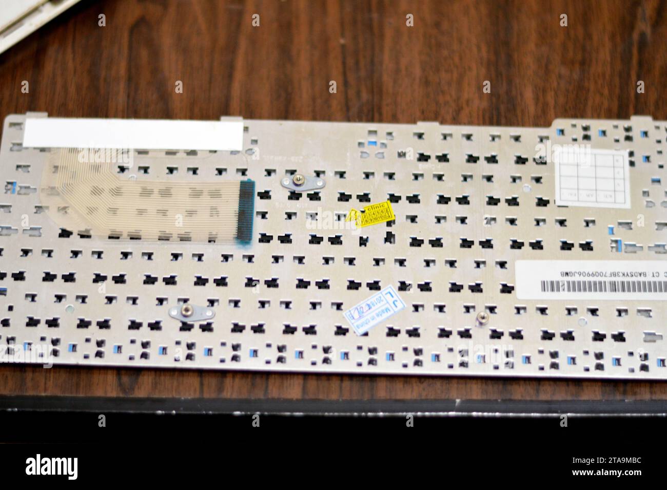 Cairo, Egypt, November 1 2023: Mini laptop keyboard maintenance, fixing ...