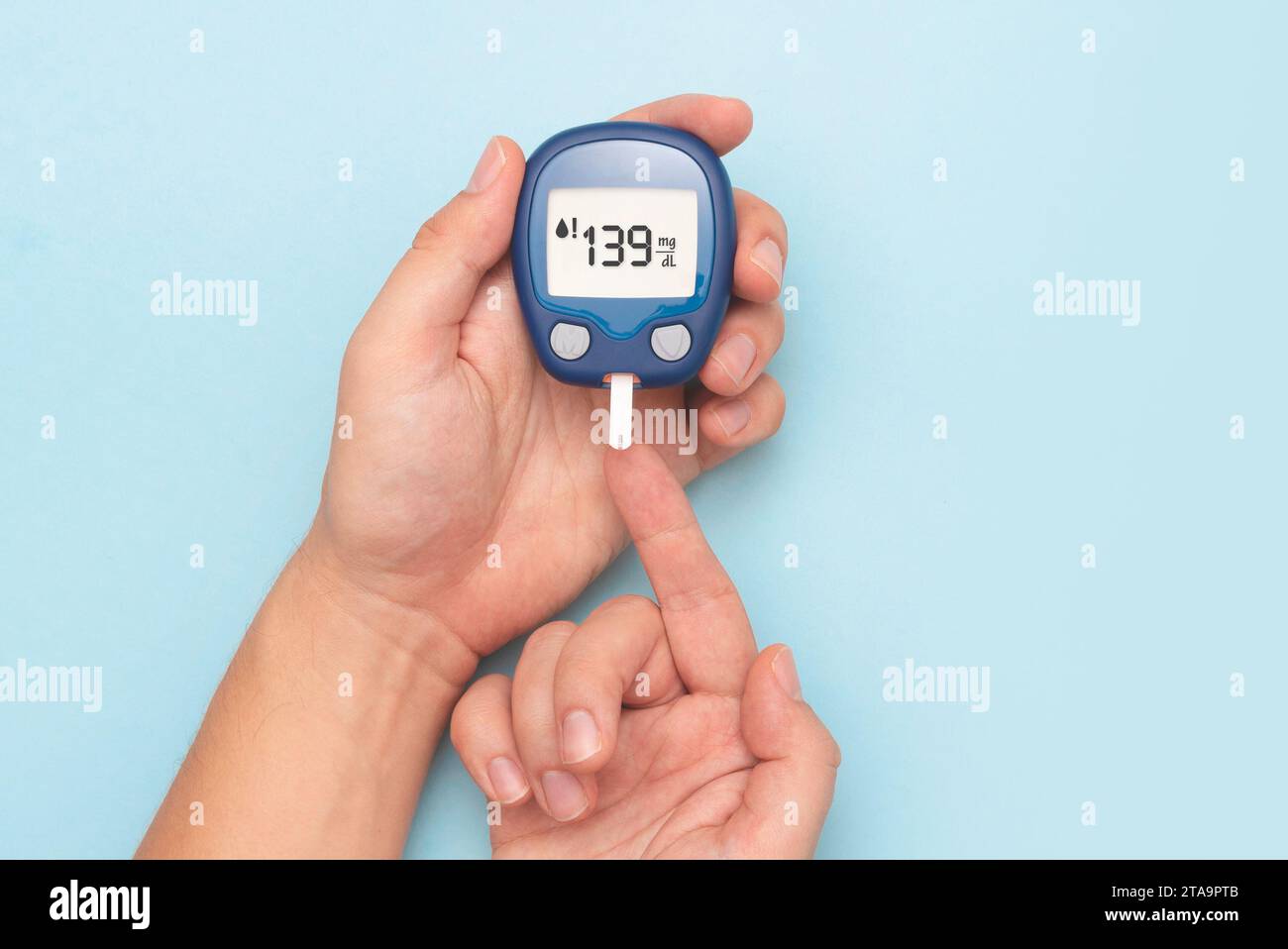 Man using glucometer, blood glucose test. Diabetes concept Stock Photo ...