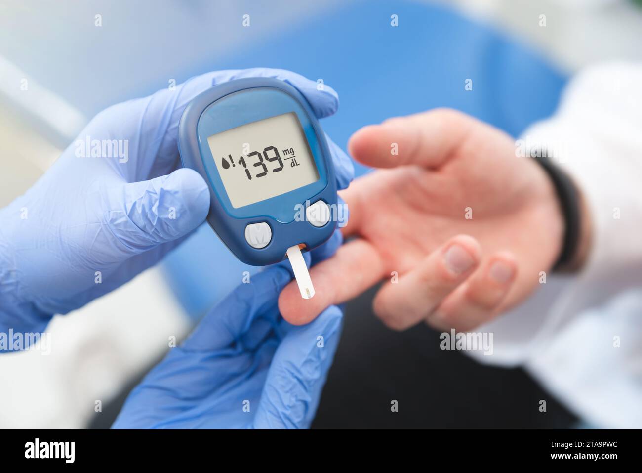 Doctor using glucometer, blood glucose test. Diabetes concept Stock ...