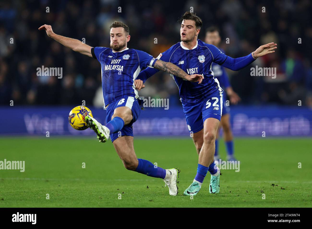 Cardiff, UK. 28th Nov, 2023. Joe Ralls of Cardiff City (l) and Ollie ...