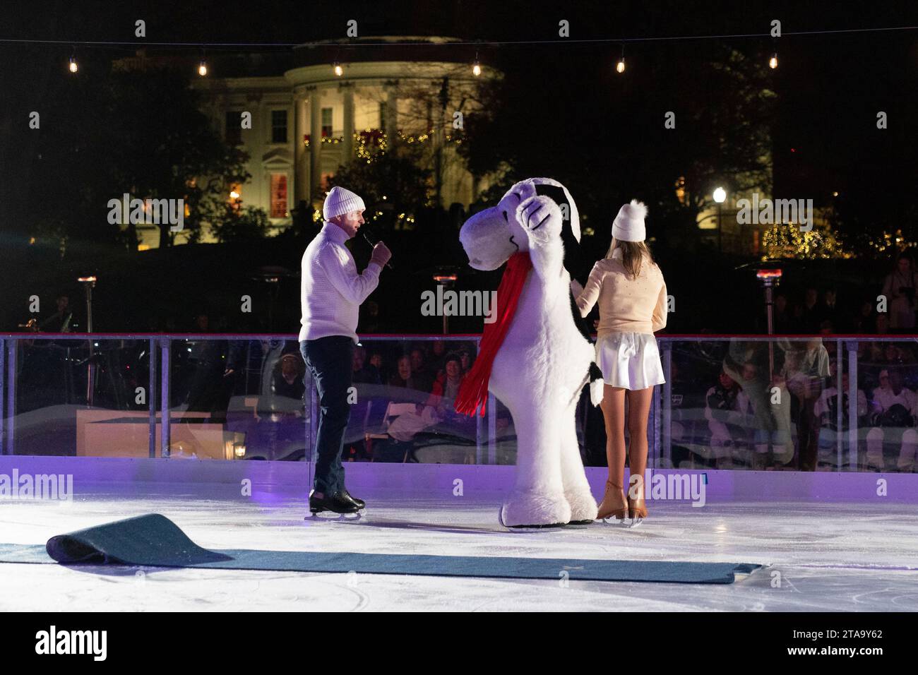 Olympic figure skater Brian Boitano, left, talks with Snoopy and Kim ...