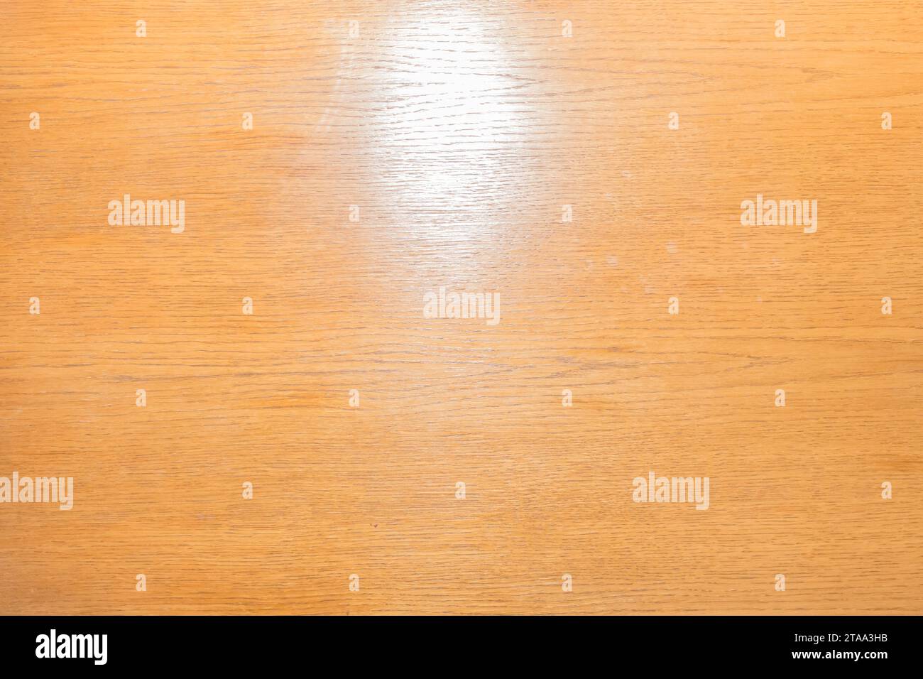 White bright light spot flare on yellow table surface background Stock ...