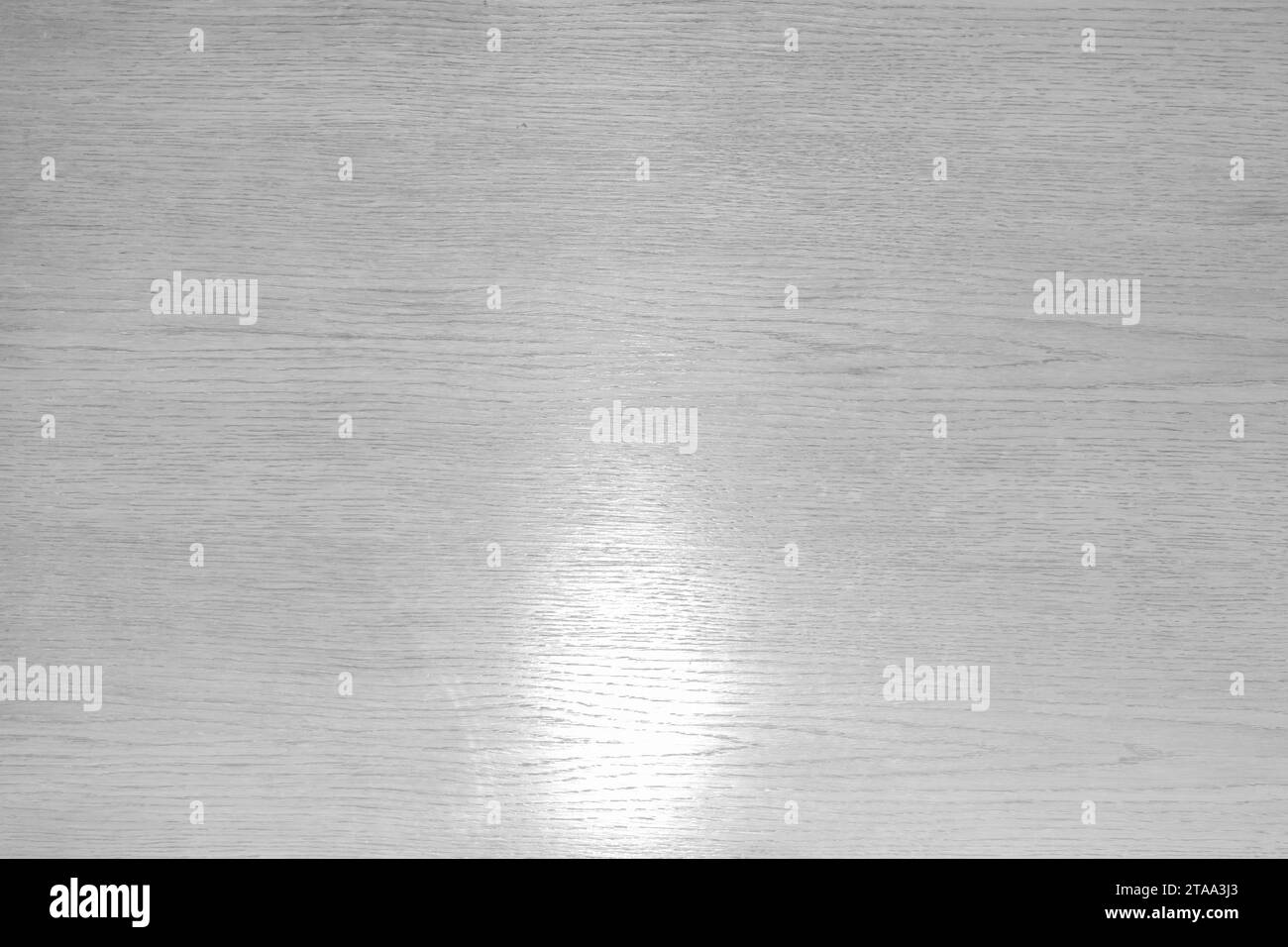 White bright light spot flare on grey table surface background gray ...