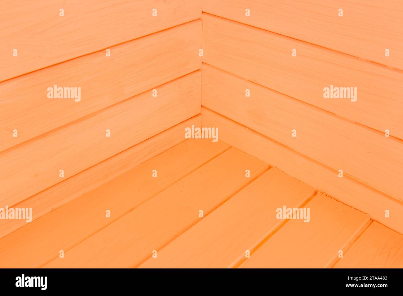 Wooden orange color boards corner plank joint interior part sample wall ...