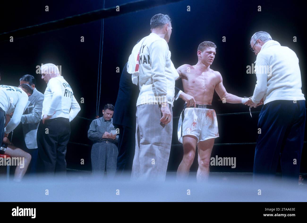 NEW YORK, NY - JUNE 1: Larry Boardman (white trunks) has the handler ...