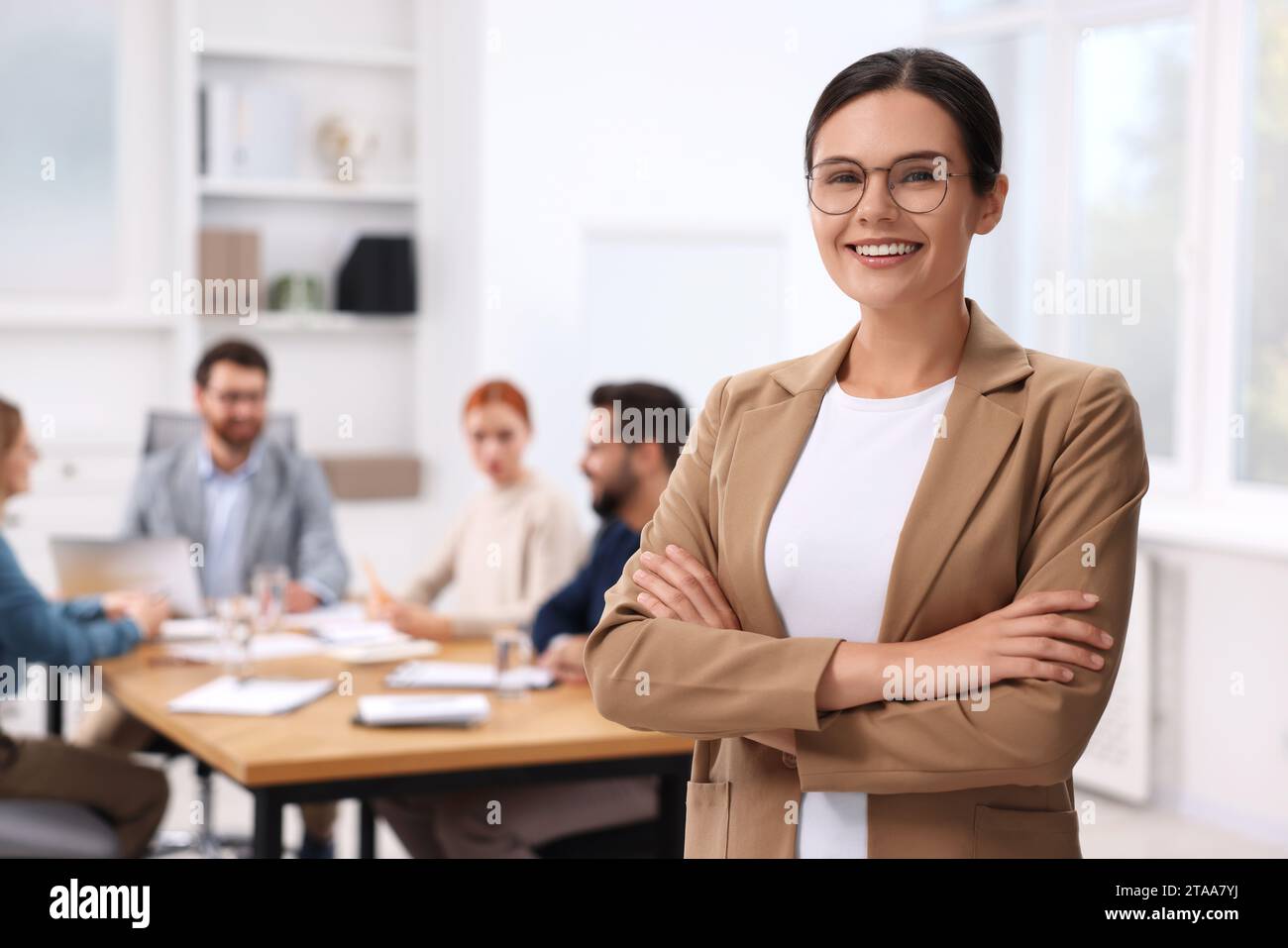 Team of employees working together in office. Happy woman indoors Stock ...
