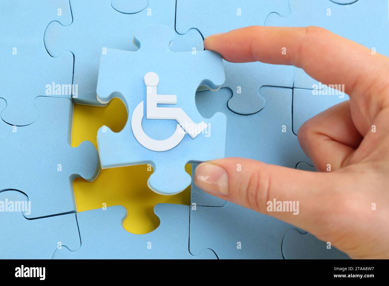 Inclusion concept. Woman putting light blue puzzle with international ...