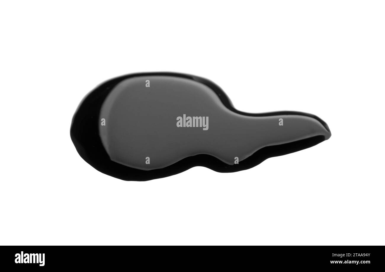 Blot of black liquid on white background Stock Photo - Alamy