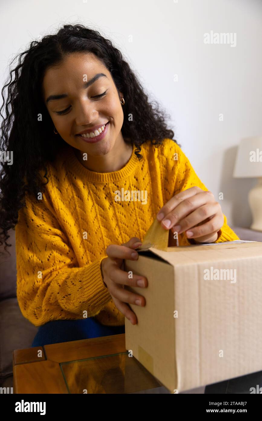 Happy person opening package hi-res stock photography and images - Alamy