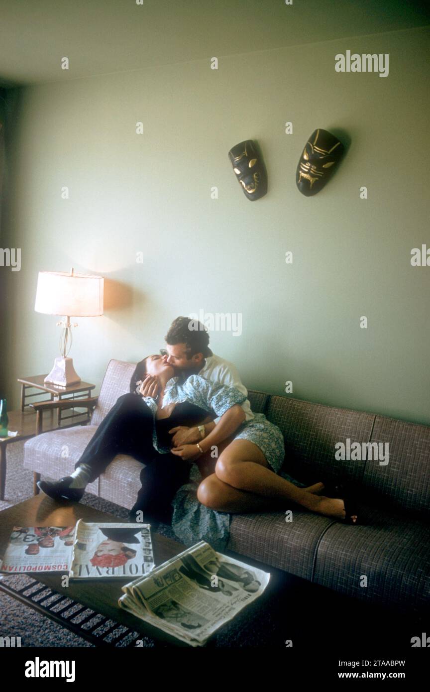 LAS VEGAS, NV - 1958: Actress and model Kitty Dolan lies on the couch ...