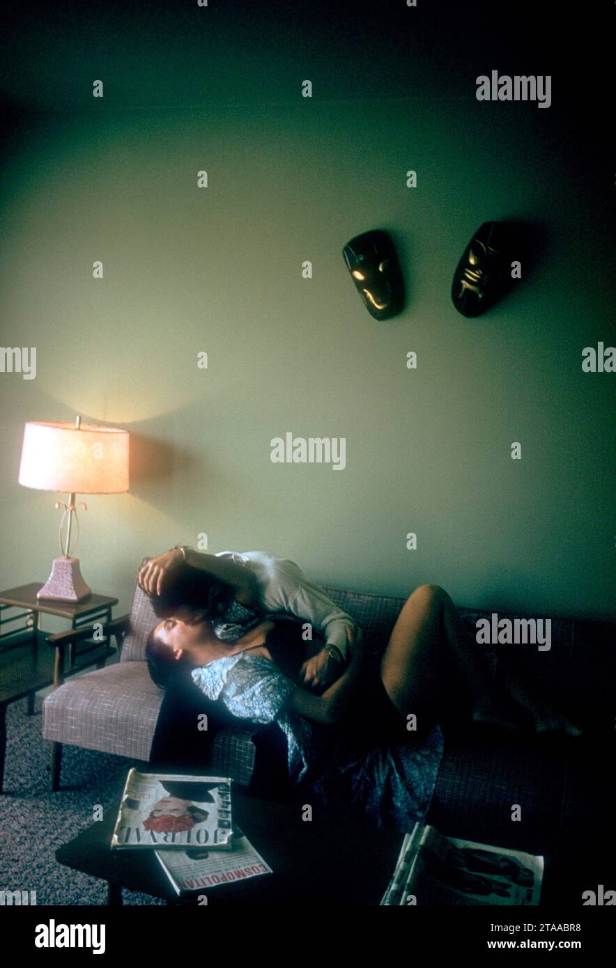 LAS VEGAS, NV - 1958: Actress and model Kitty Dolan lies on the couch ...