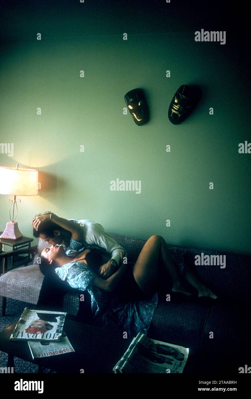 LAS VEGAS, NV - 1958: Actress and model Kitty Dolan lies on the couch ...