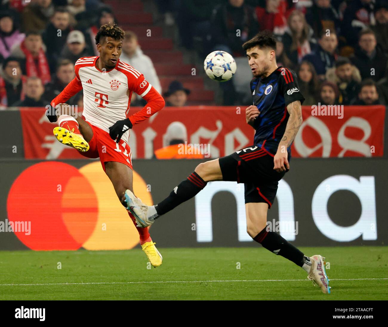 Munich, Germany. 29th Nov, 2023. Kingsley Coman (L) of Bayern Munich ...